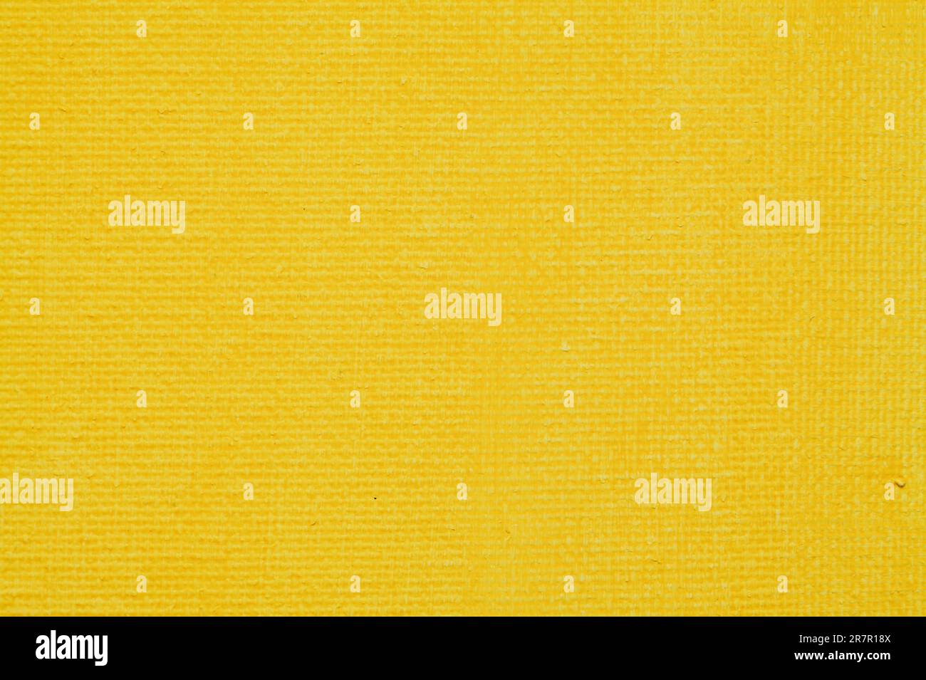 Canvas with a yellow ground color, uneven rough weave Stock Photo - Alamy