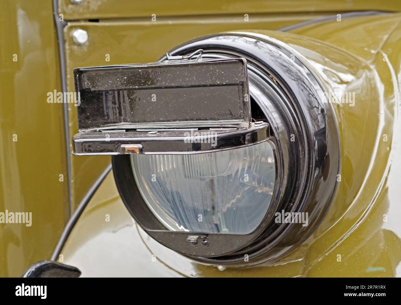 military car headlight with disguise closeup Stock Photo - Alamy