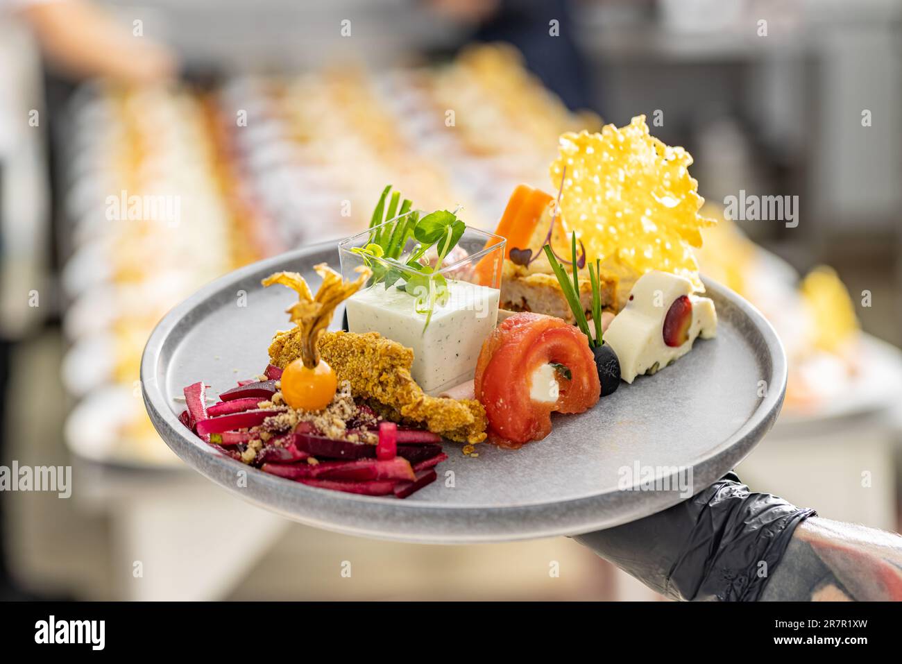 Fancy starter plate for wedding table prepared by a professional chef ...