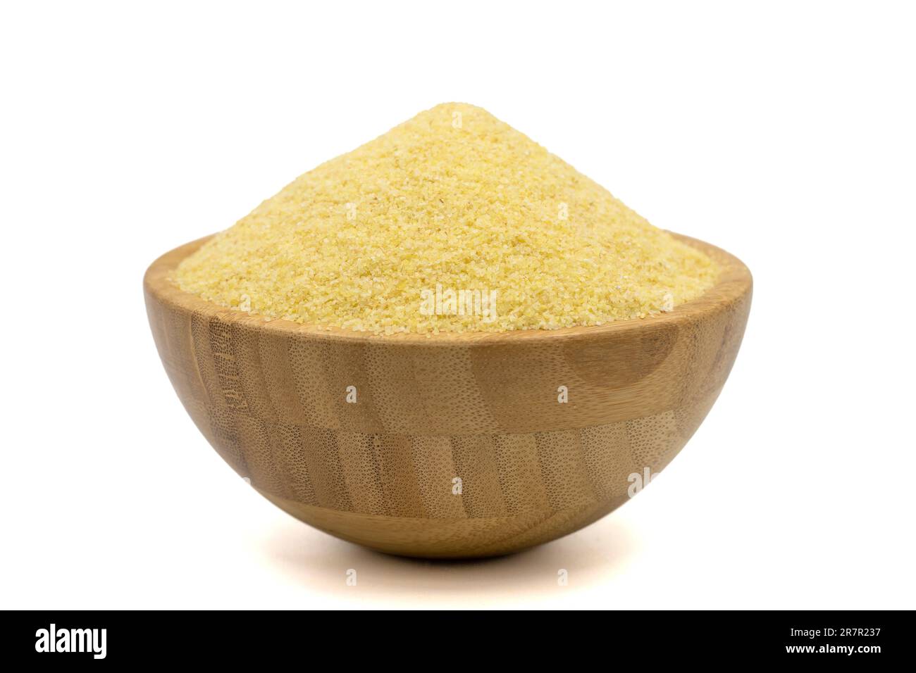 Dry organic semolina flour isolated on white background. Uncooked ...