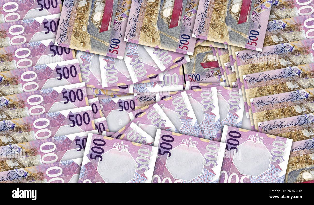 Qatar Riyal banknotes in a cash fan mosaic pattern. 500 QAR money notes ...