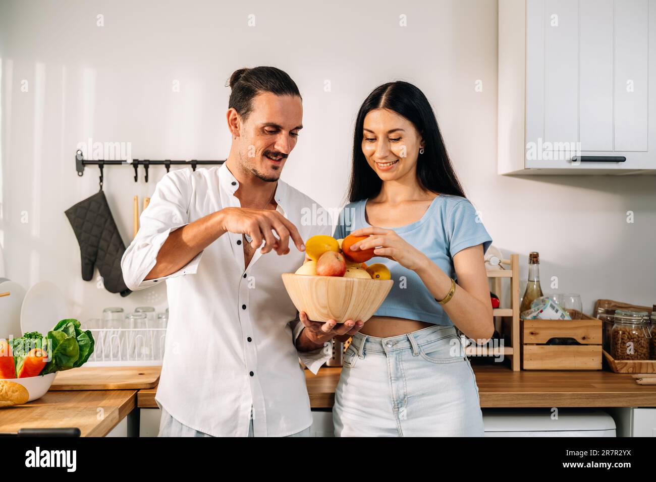 Healthy lovers cooking food in kitchen, Couple spending time together ...