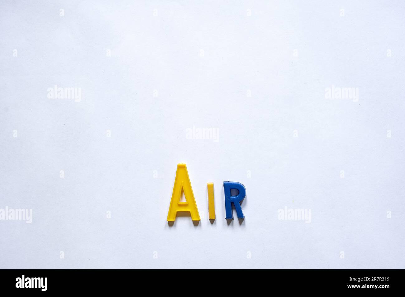The word "AIR" is created by arranging a set of 3D colorful plastic ...
