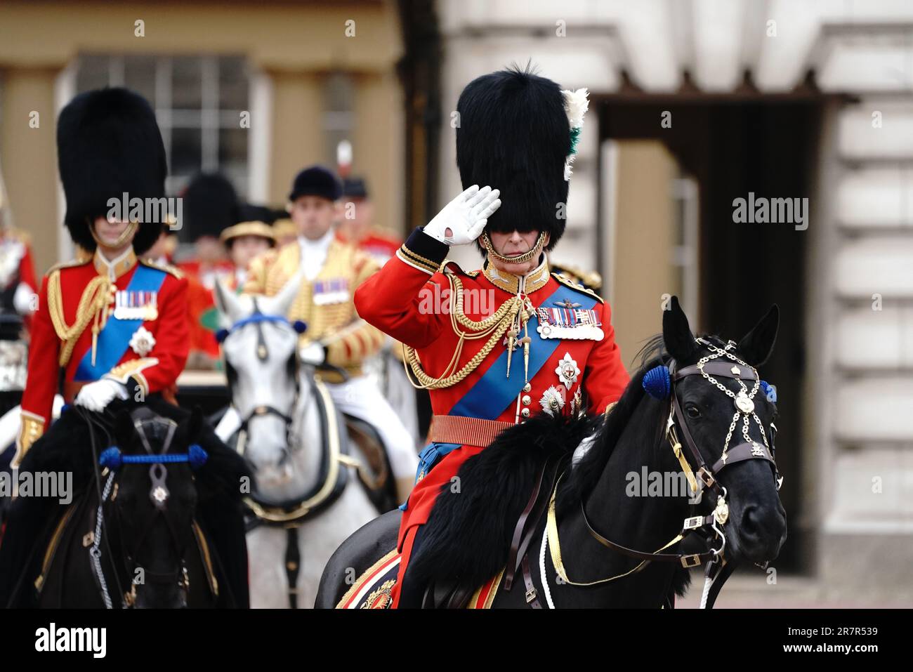 King Charles III salutes as he departs Buckingham Palace for the ...