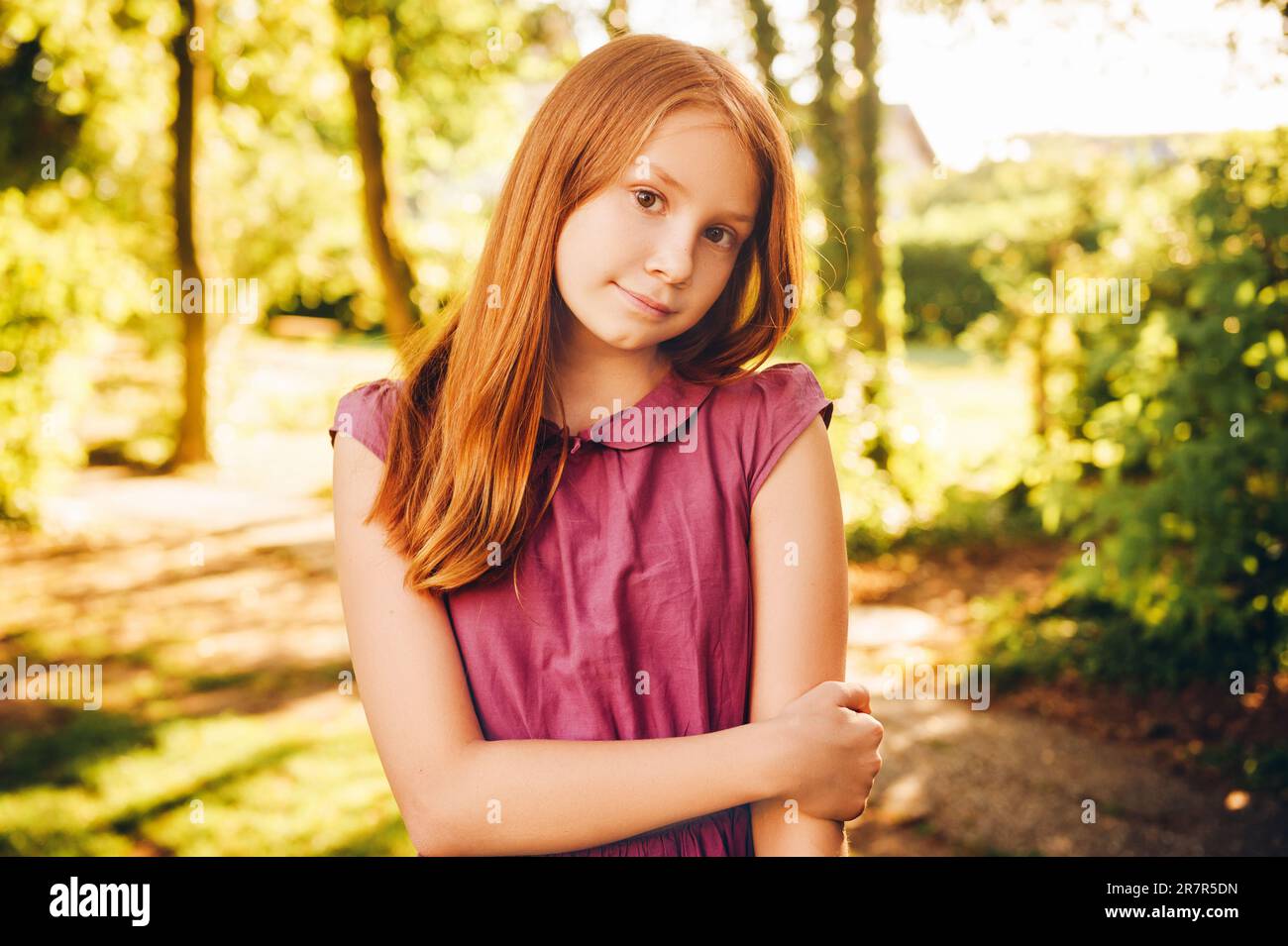 Outdoor portrait of 10-12 year old girl in summer park Stock Photo - Alamy