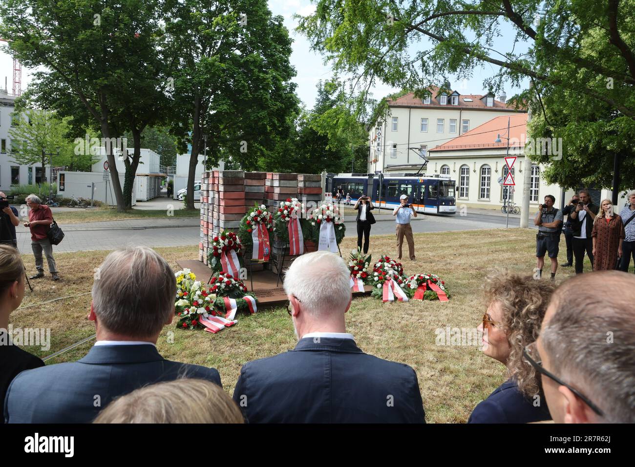 Jena, Germany. 17th June, 2023. Participants stand at a memorial for ...