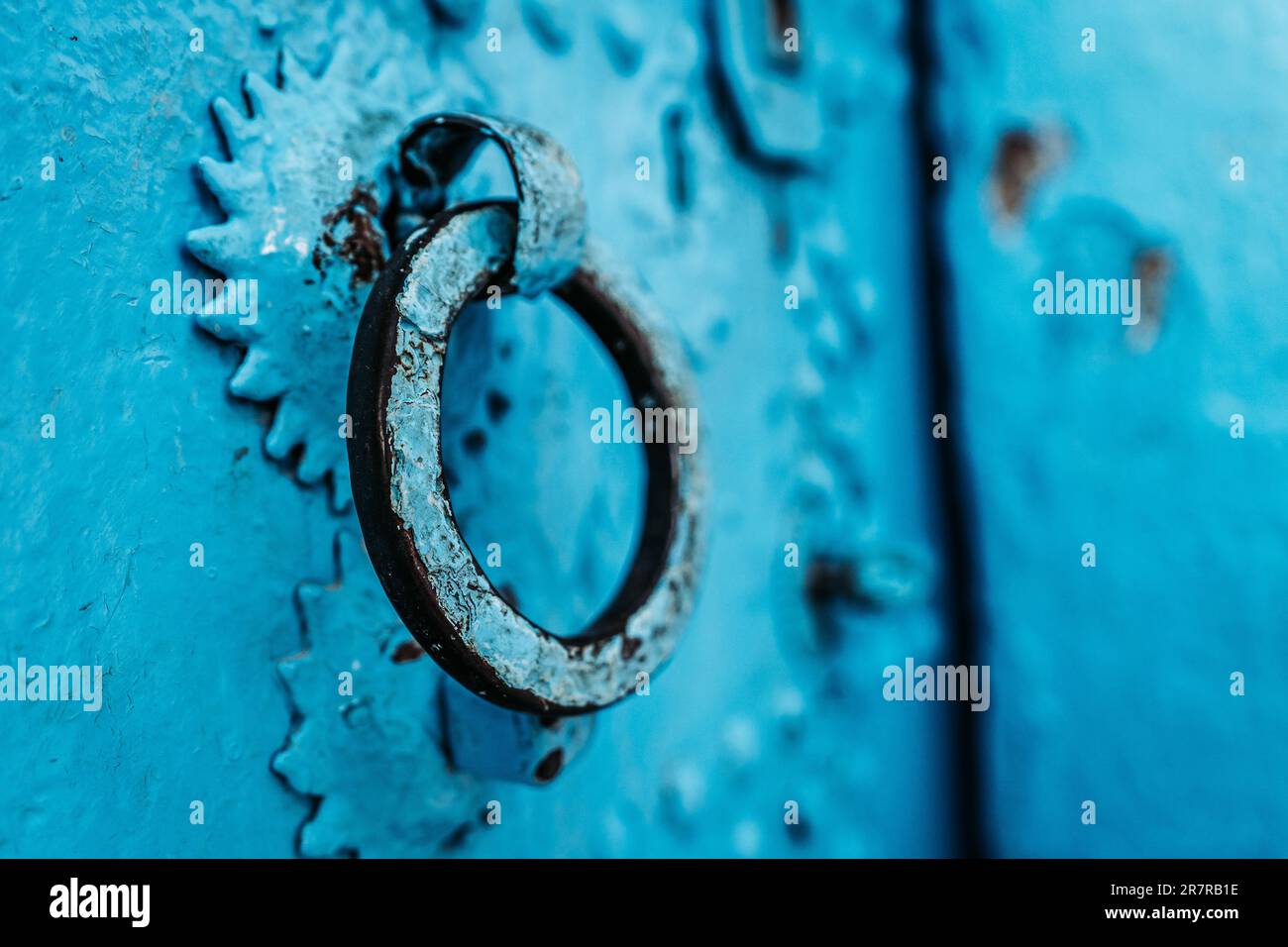 Vibrant blue house post: Numbers adorn this eye-catching house post ...