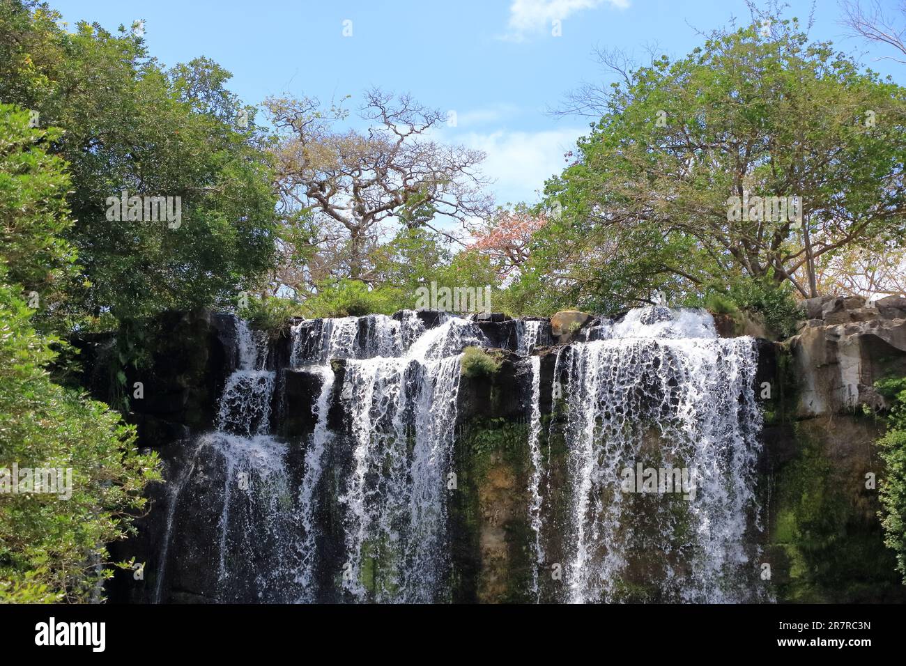 the Front view of the idyllic Llano de Cortes waterfall near Bagaces ...