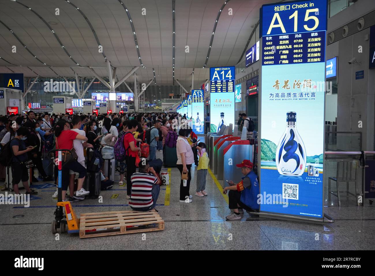 Shenzhen, China. 17th June, 2023. Travelers line up to check in at the ...
