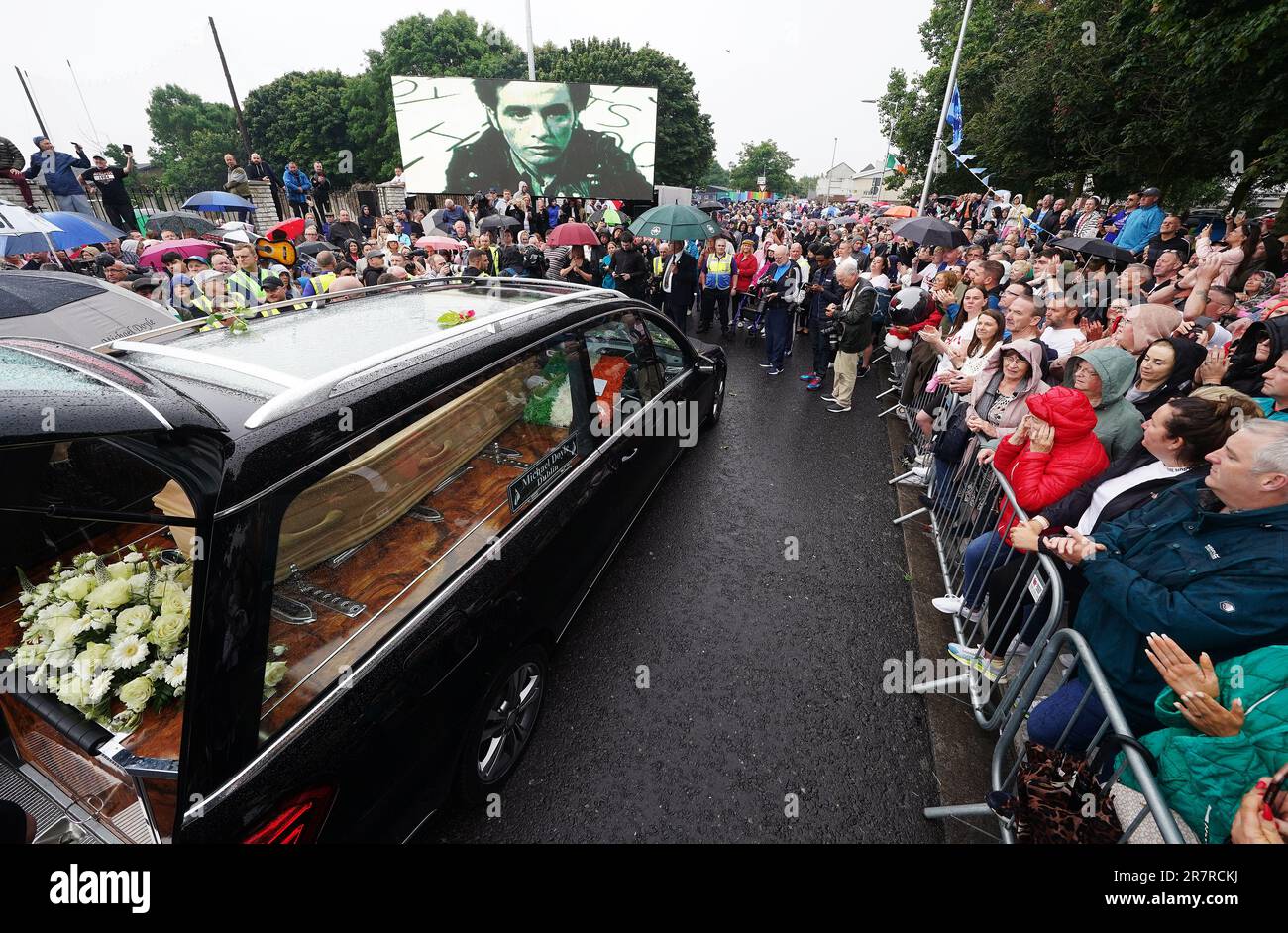 The hearse carrying the coffin of Aslan frontman Christy Dignam stops ...