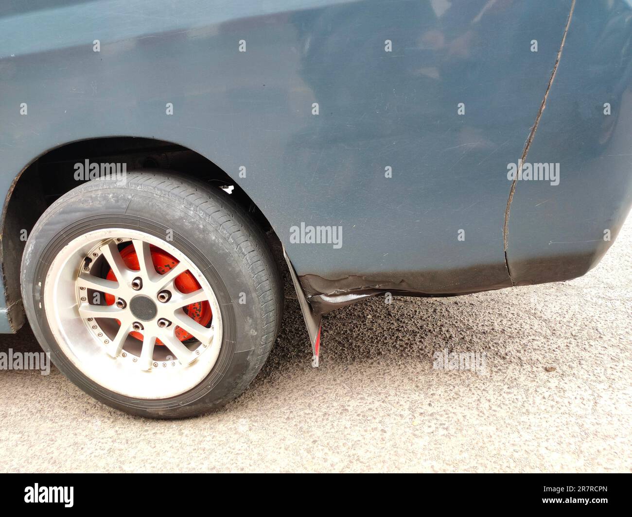 Photo of the side of a public transport car in the city, the body is ...