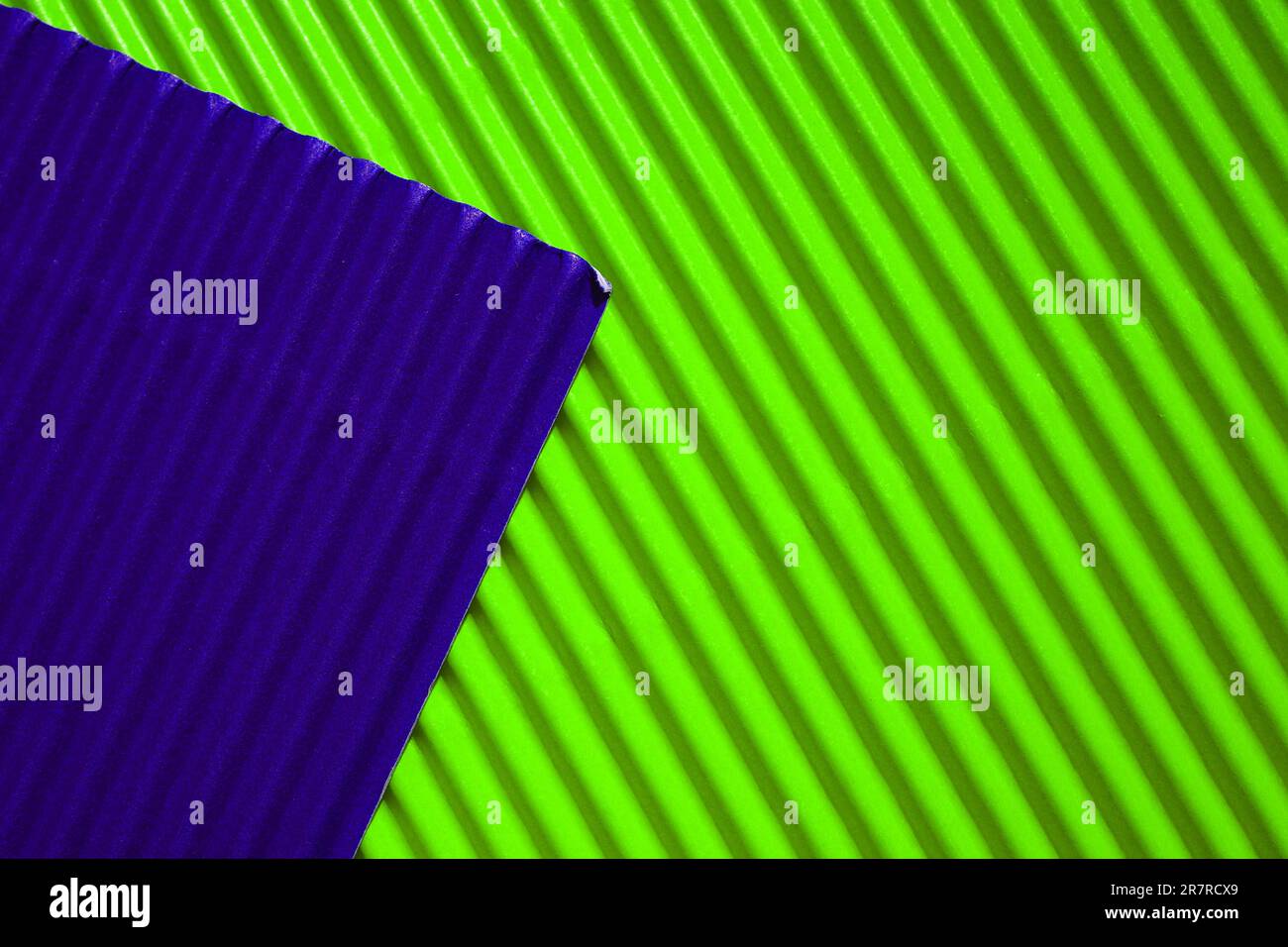 Diagonally ribbed cardboard with the colors neon green and deep purple ...