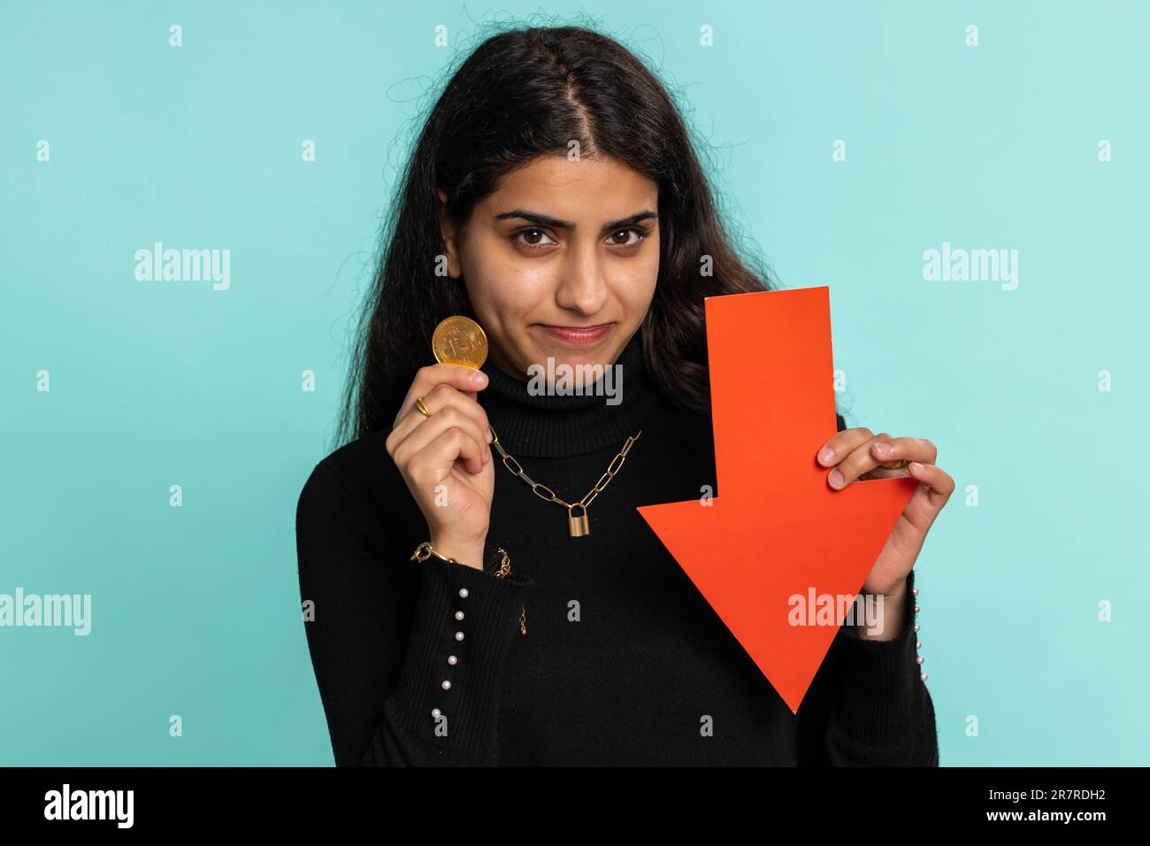 Girl showing direction arrow hi-res stock photography and images - Alamy