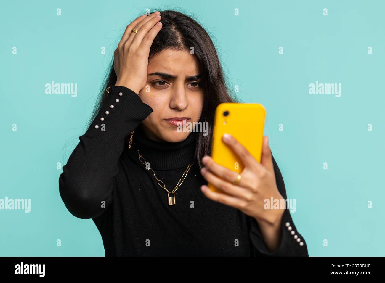 Indian woman use mobile cell phone typing browsing, loses becoming ...