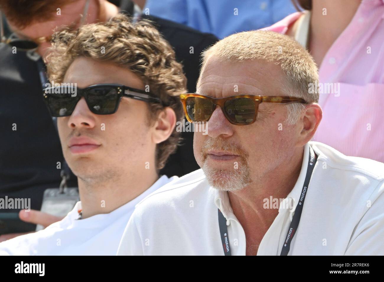 Former tennis pro Boris Becker and his son Elias, left, watch the semi ...