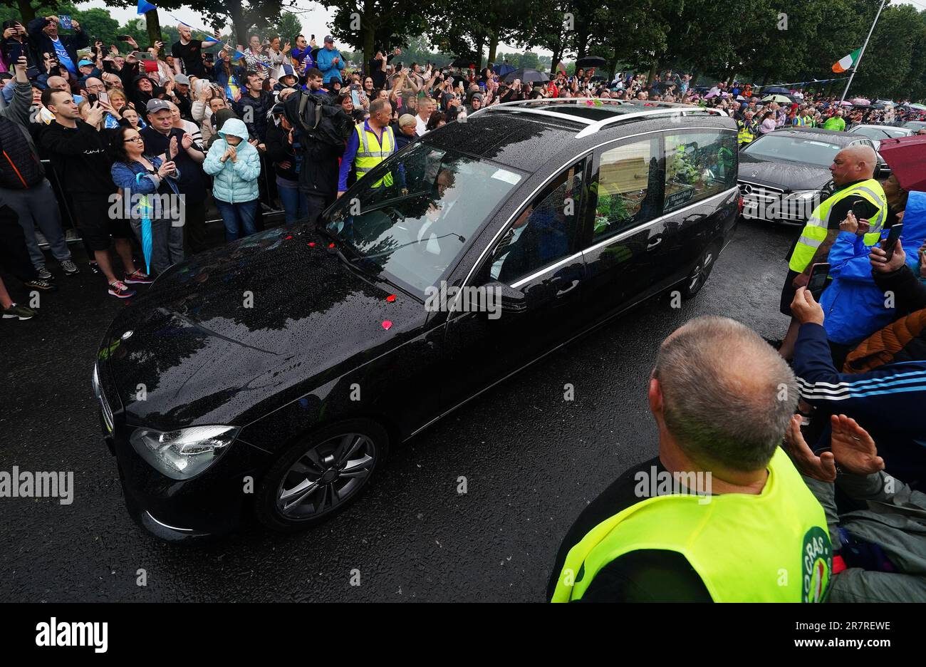 The hearse carrying the coffin of Aslan frontman Christy Dignam drives ...