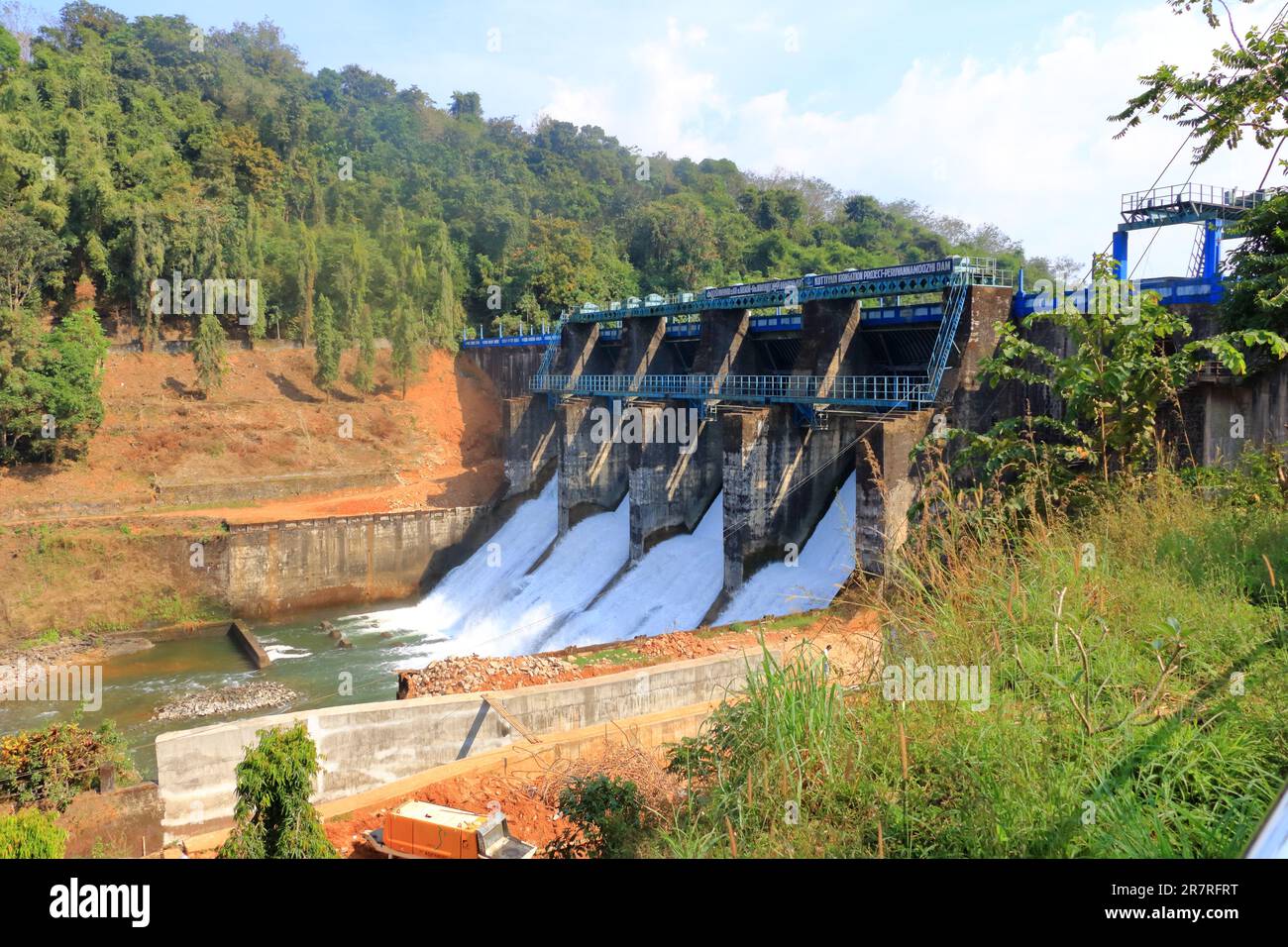 Water rushing through gates at the peruvannamuzhi (peruvannamoozhi) dam ...