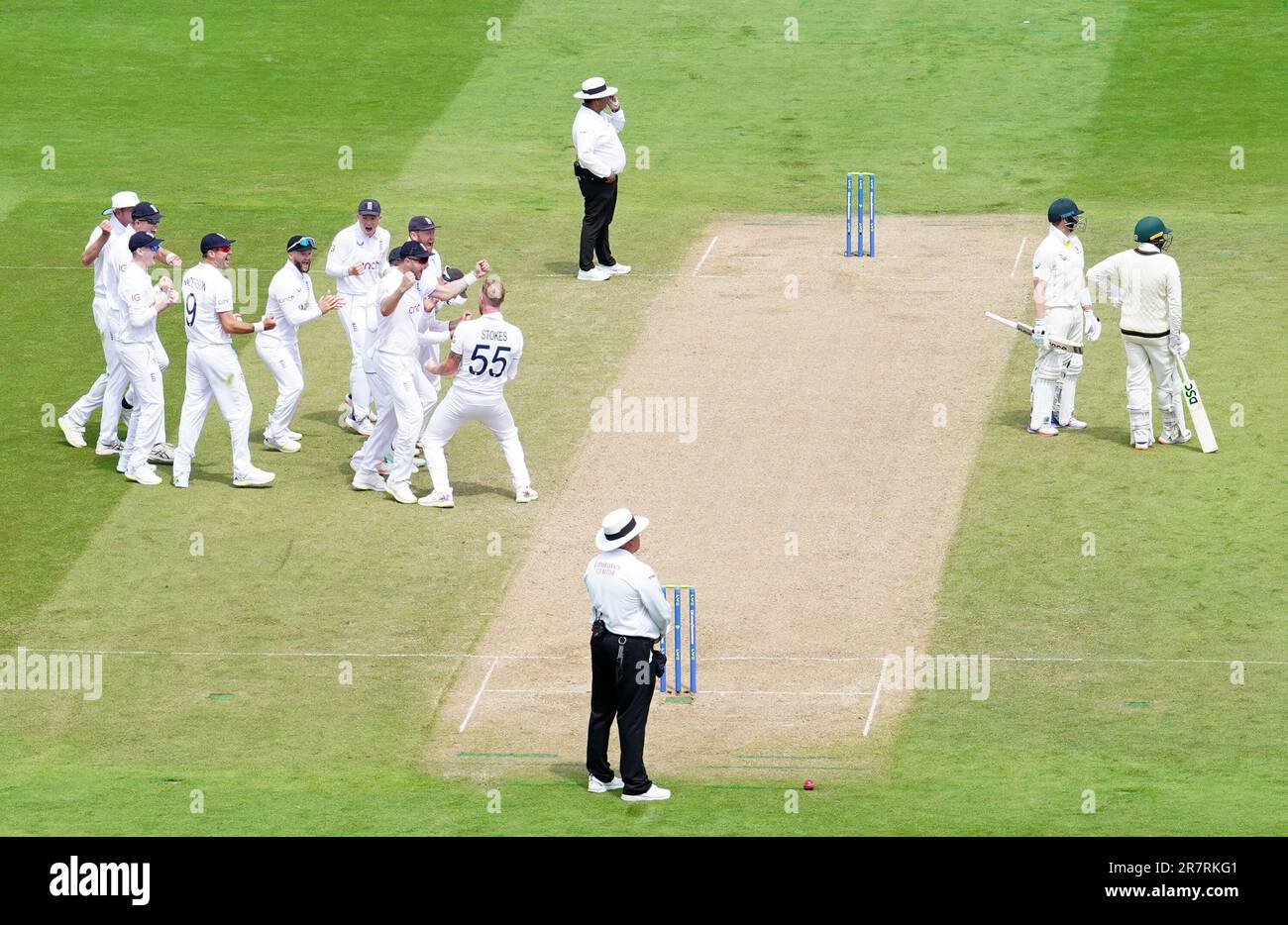 England's Ben Stokes celebrates with team-mates following a review of ...