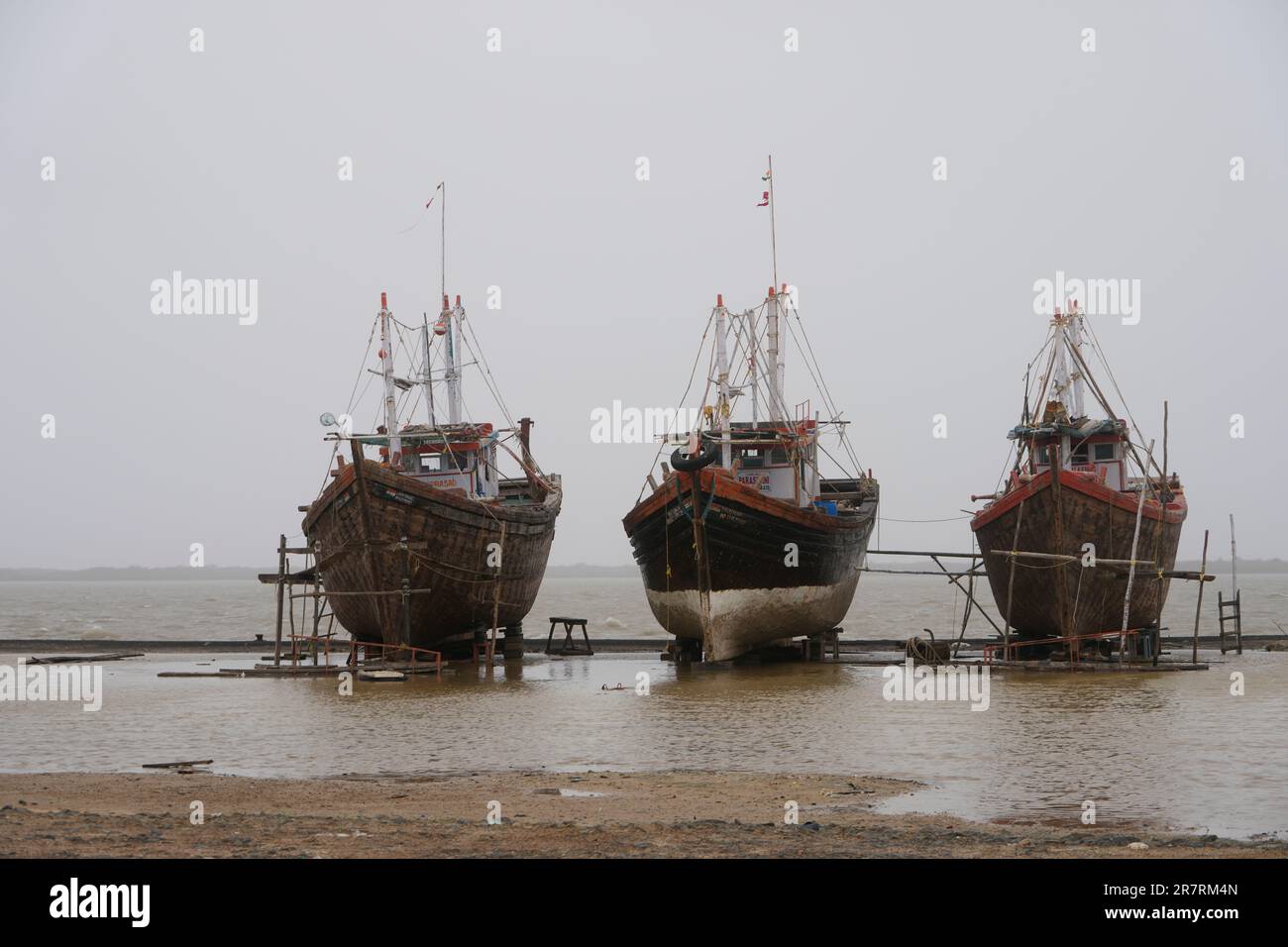 Boats are seen anchored at Jakhau port after landfall of Cyclone ...