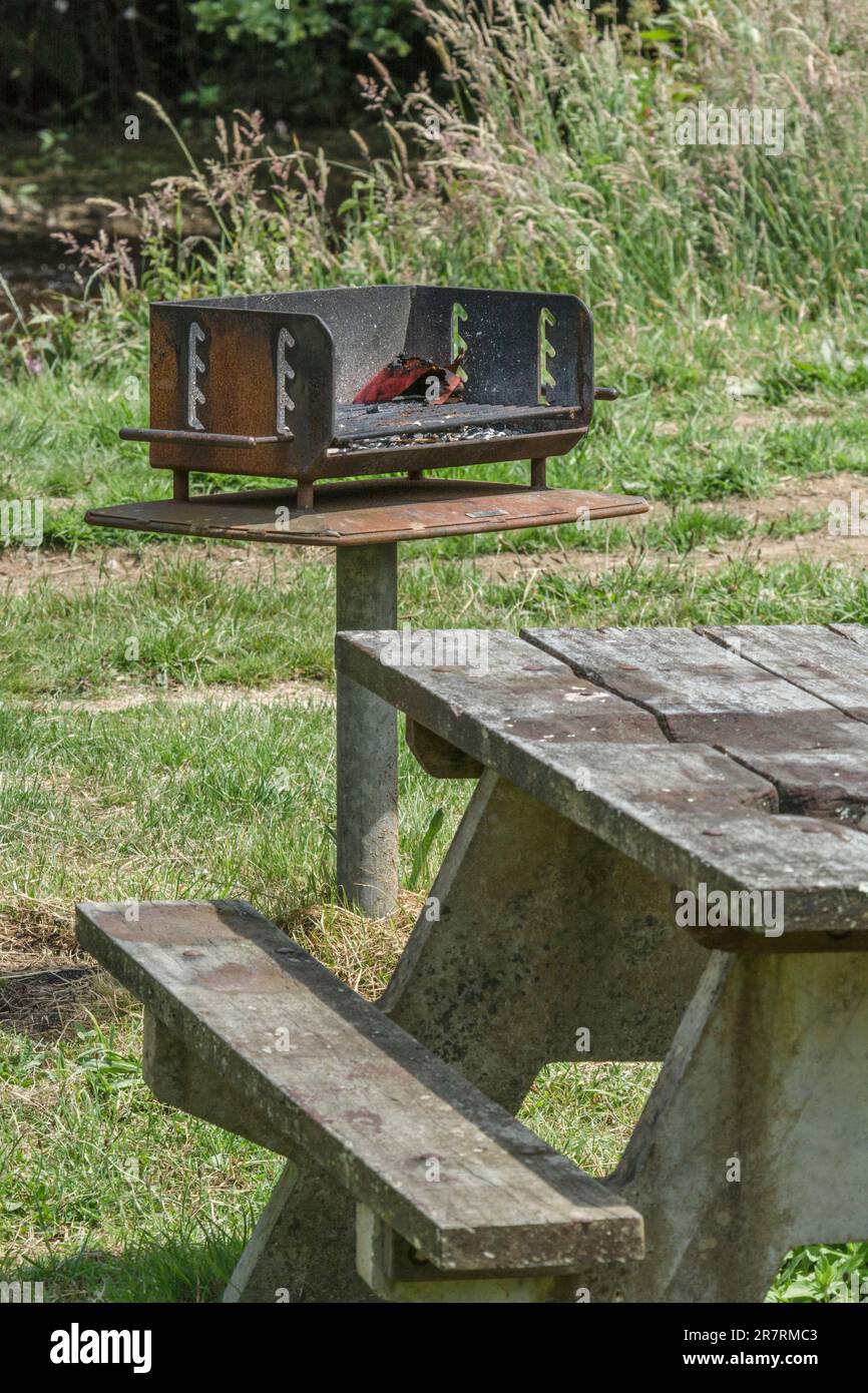 BBQ / Barbecue and bench table in municipal public park at Lostwithiel ...