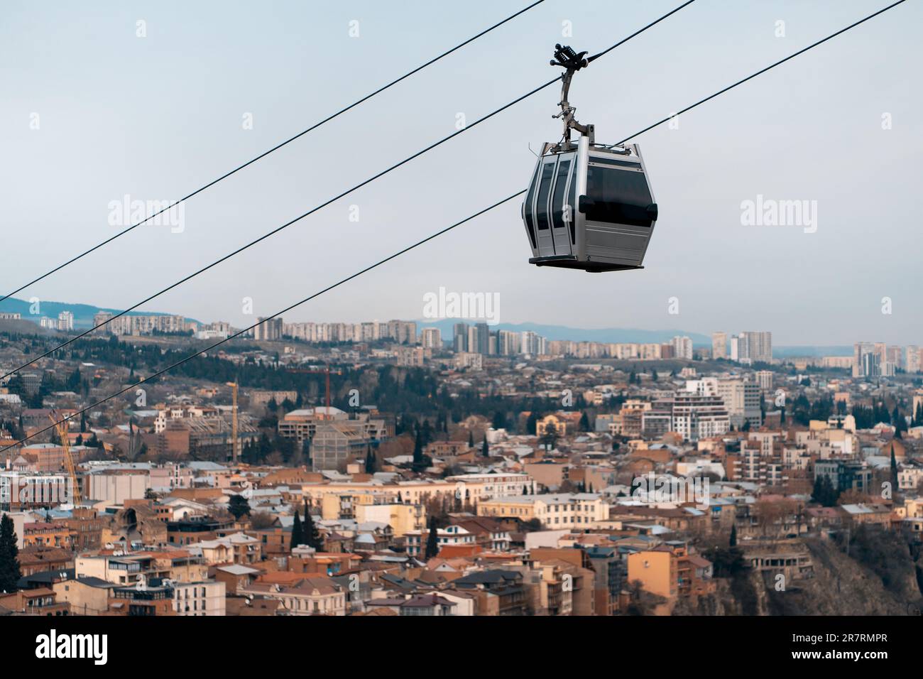 cable car rope way over Georgian capital Tbilisi, aerial of historical ...