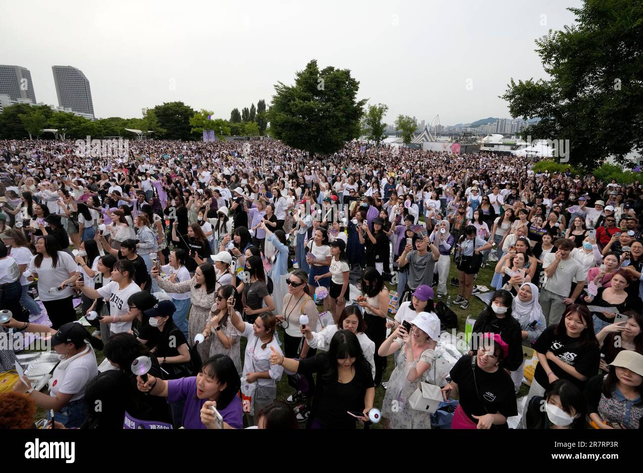 Fans of BTS gather during an event to celebrate the 10th debut ...