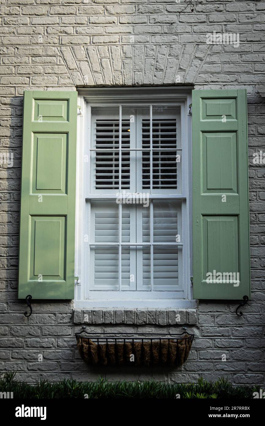 Close up of the color windows of a colonial era home in Charleston ...
