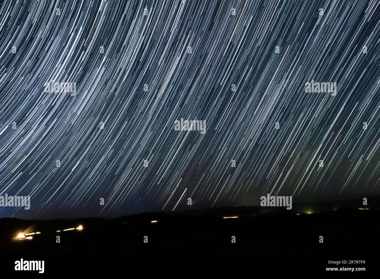 Moving Universe. Night sky stair trails with light streaks from distant ...