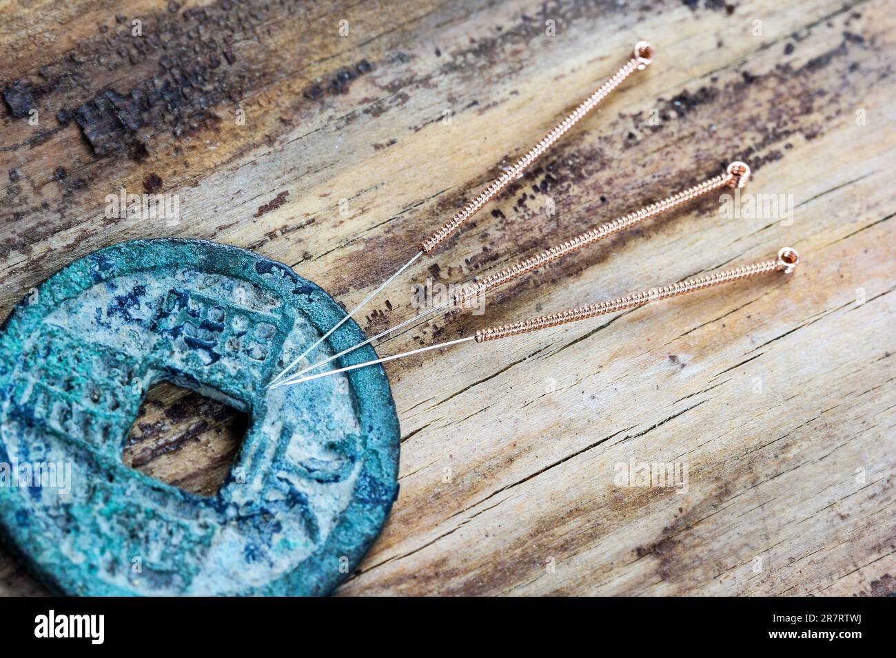 Acupuncture needles antique chinese coin hi-res stock photography and ...