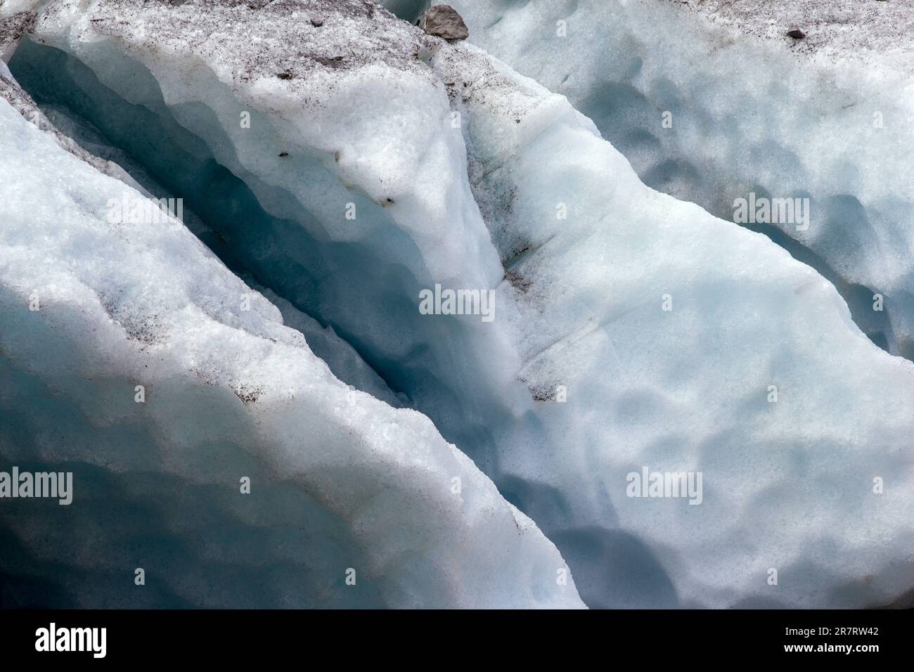 Details of glacier glacier cleaves in bright blue light and beautiful ...