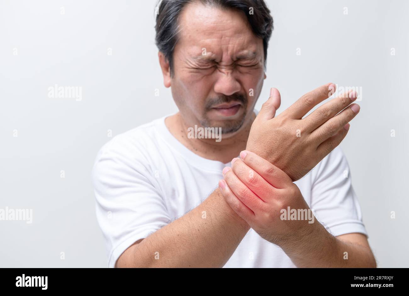 Bearded man felt his wrist hurt and massaging sore zone isolated on ...