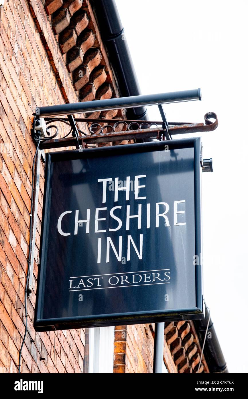 Close up of The Cheshire inn pub sign on outside wall UK Stock Photo ...