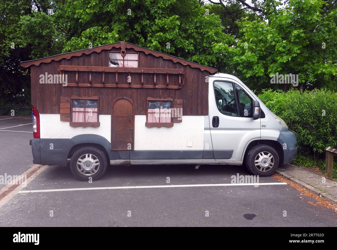 A British motorhome conversion designed to look like a log cabin Stock ...