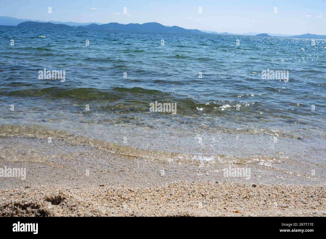 Otsu, Shiga Prefecture, Japan. 19th Mar, 2023. Waves crashing on the ...