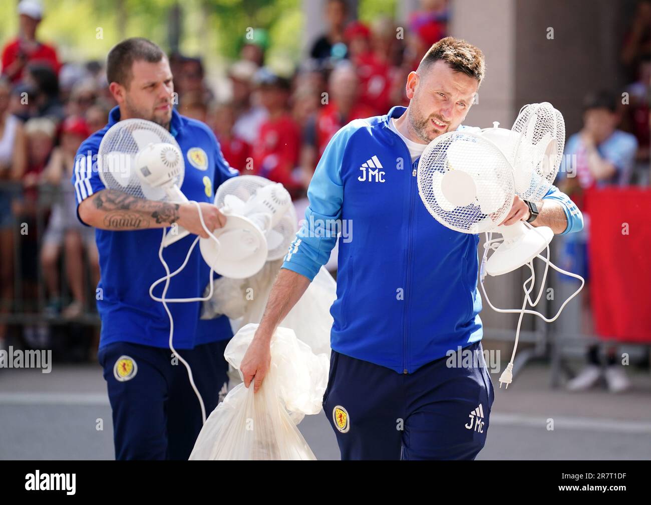 Scotland staff take fans into the stadium before the UEFA Euro 2024 ...