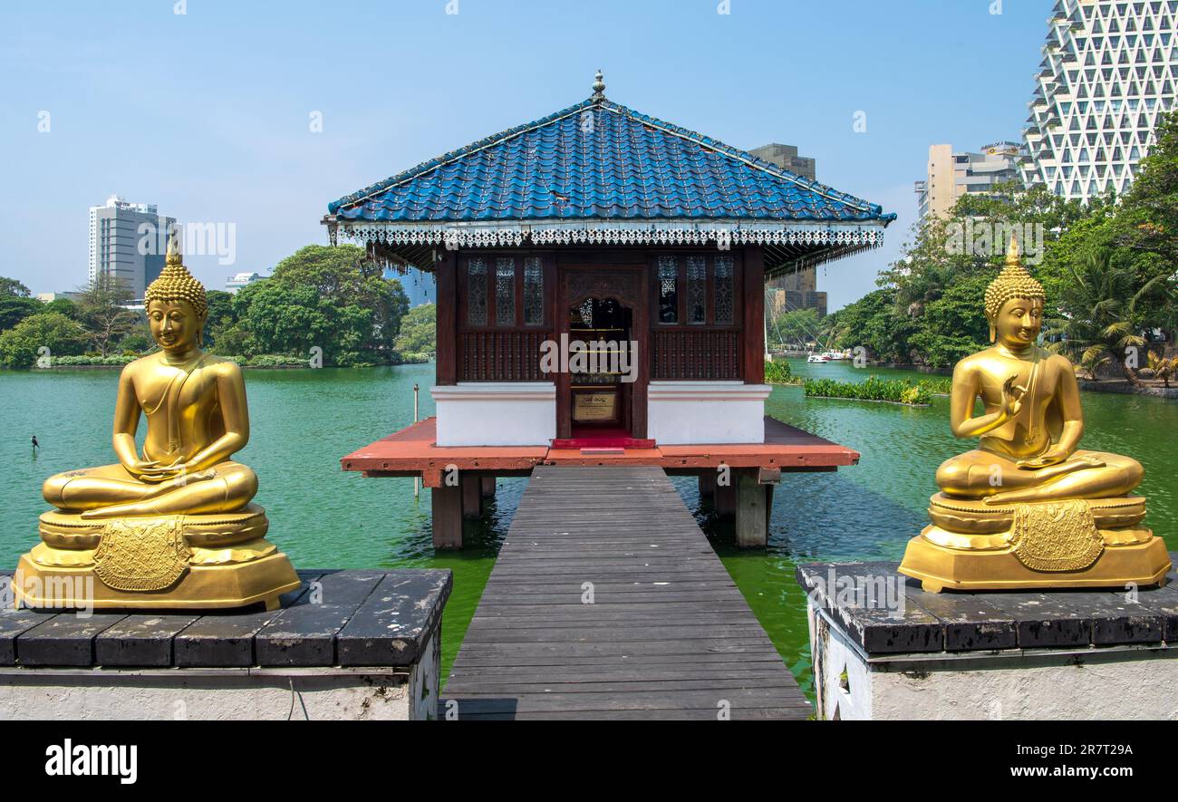 Golden Buddha statues at the Seema Malaka Buddhist Temple overlooking ...