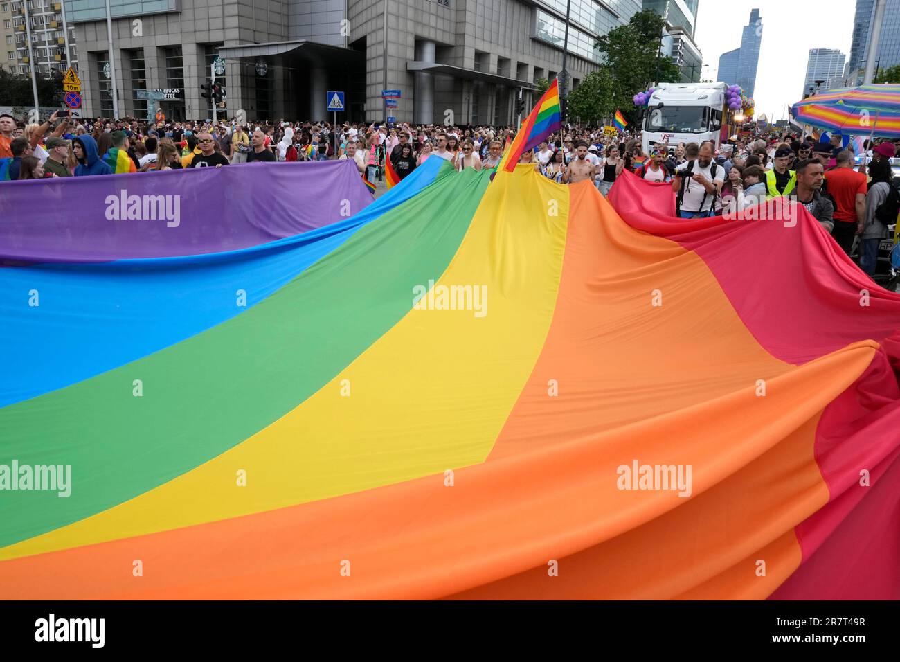 People carry rainbow flag during the yearly pride parade, known as the ...