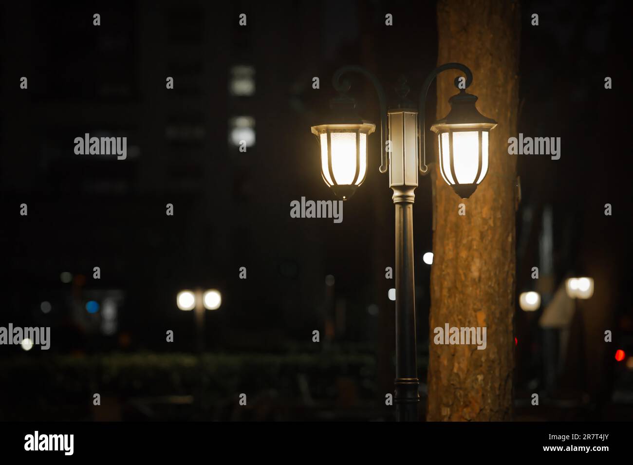 Street lamps at night Stock Photo - Alamy