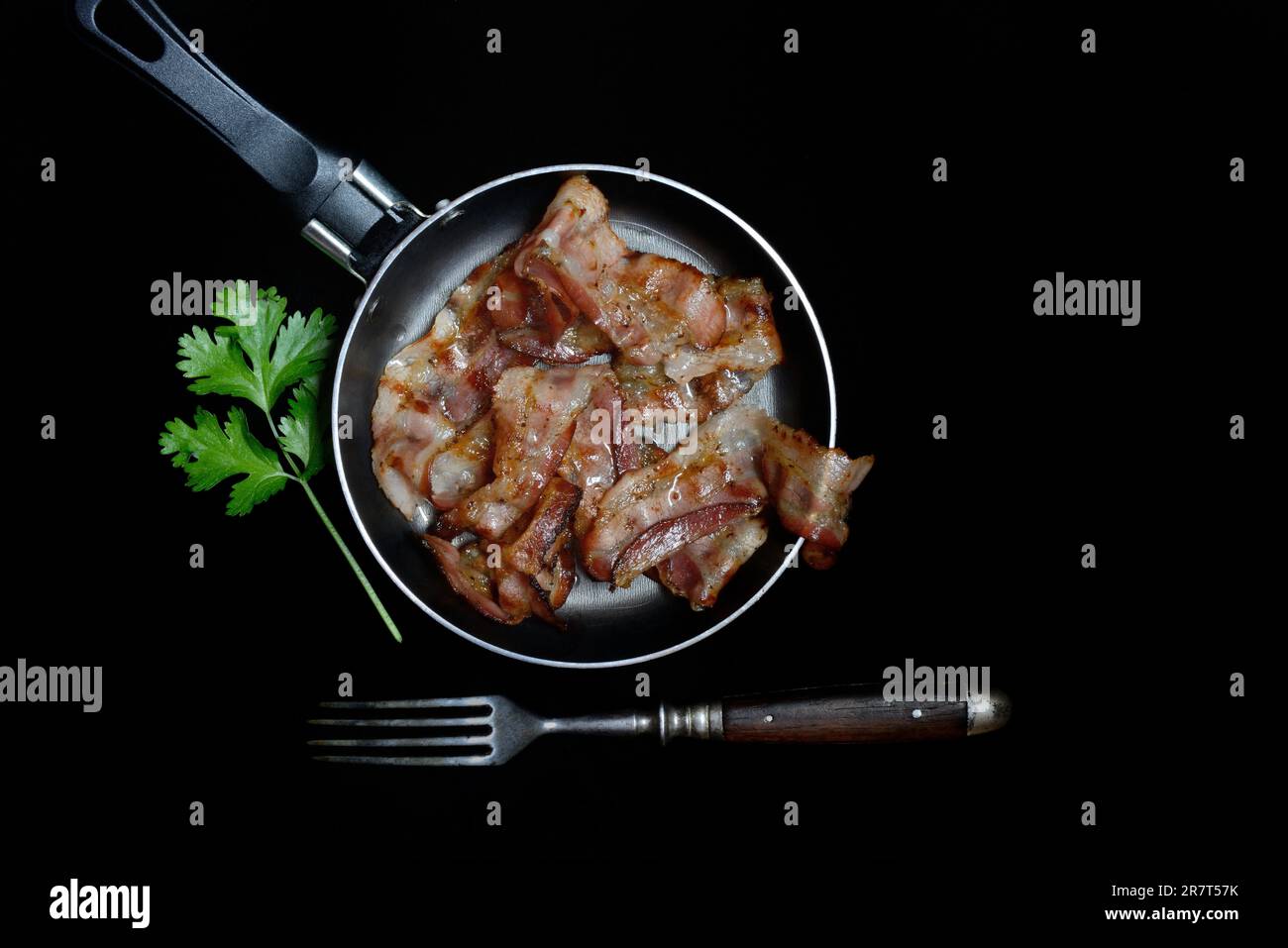 Fried bacon, bacon strips in frying pan, breakfast bacon Stock Photo ...