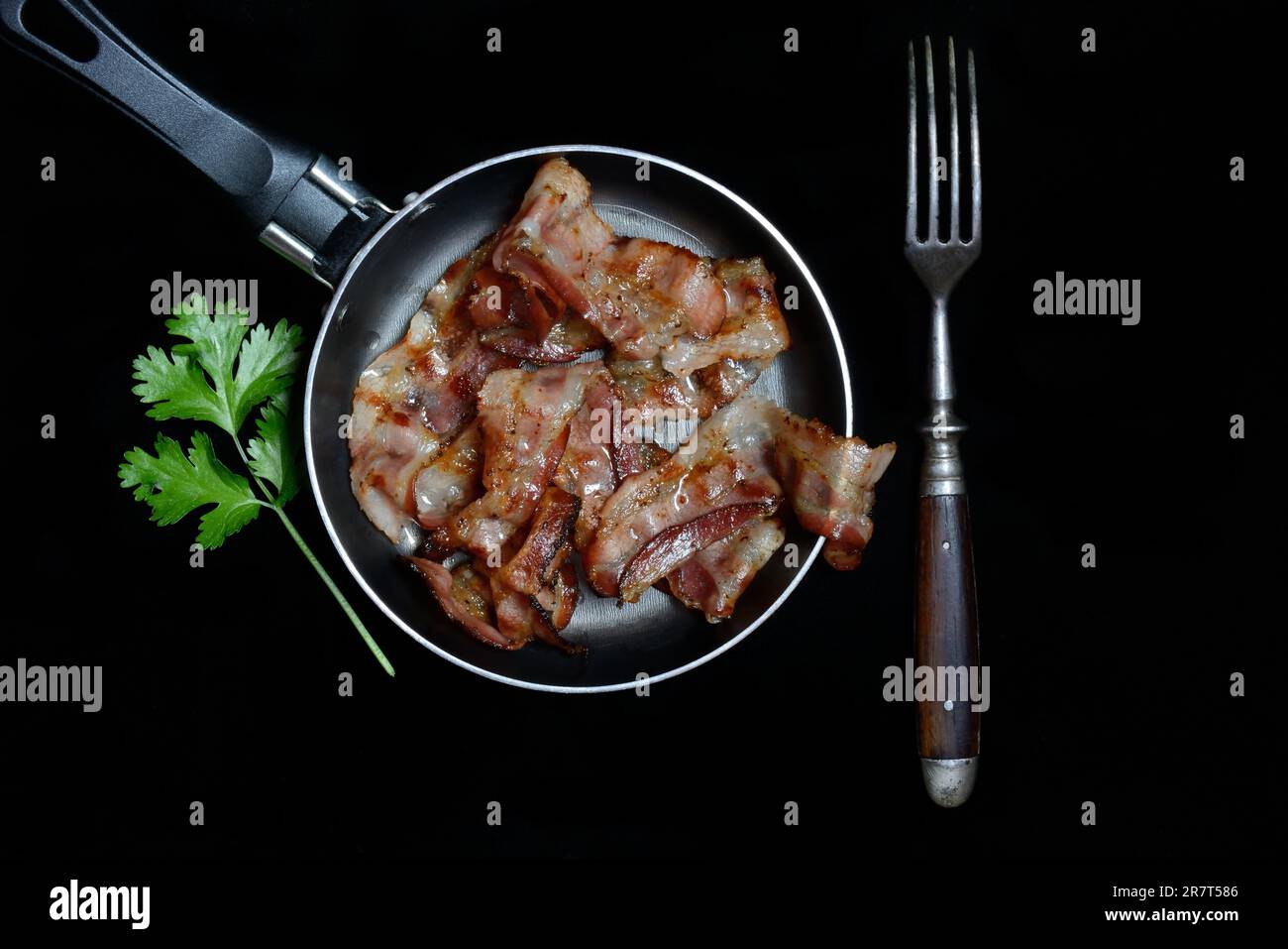 Fried bacon, bacon strips in frying pan, breakfast bacon Stock Photo ...