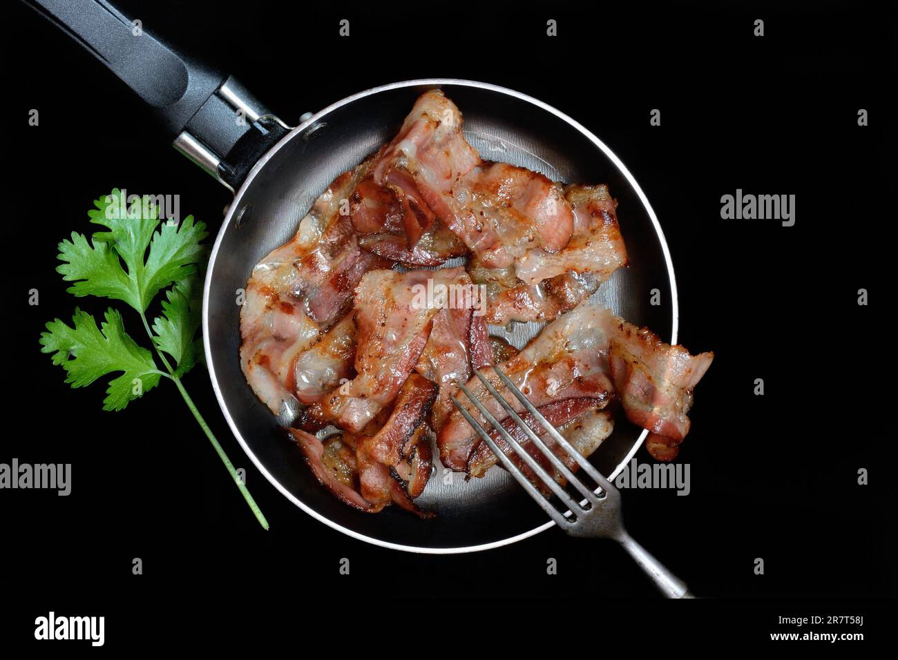 Fried bacon, bacon strips in frying pan, breakfast bacon Stock Photo ...
