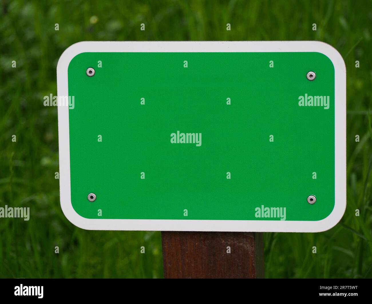 Blank green sign for own design with white background Stock Photo - Alamy