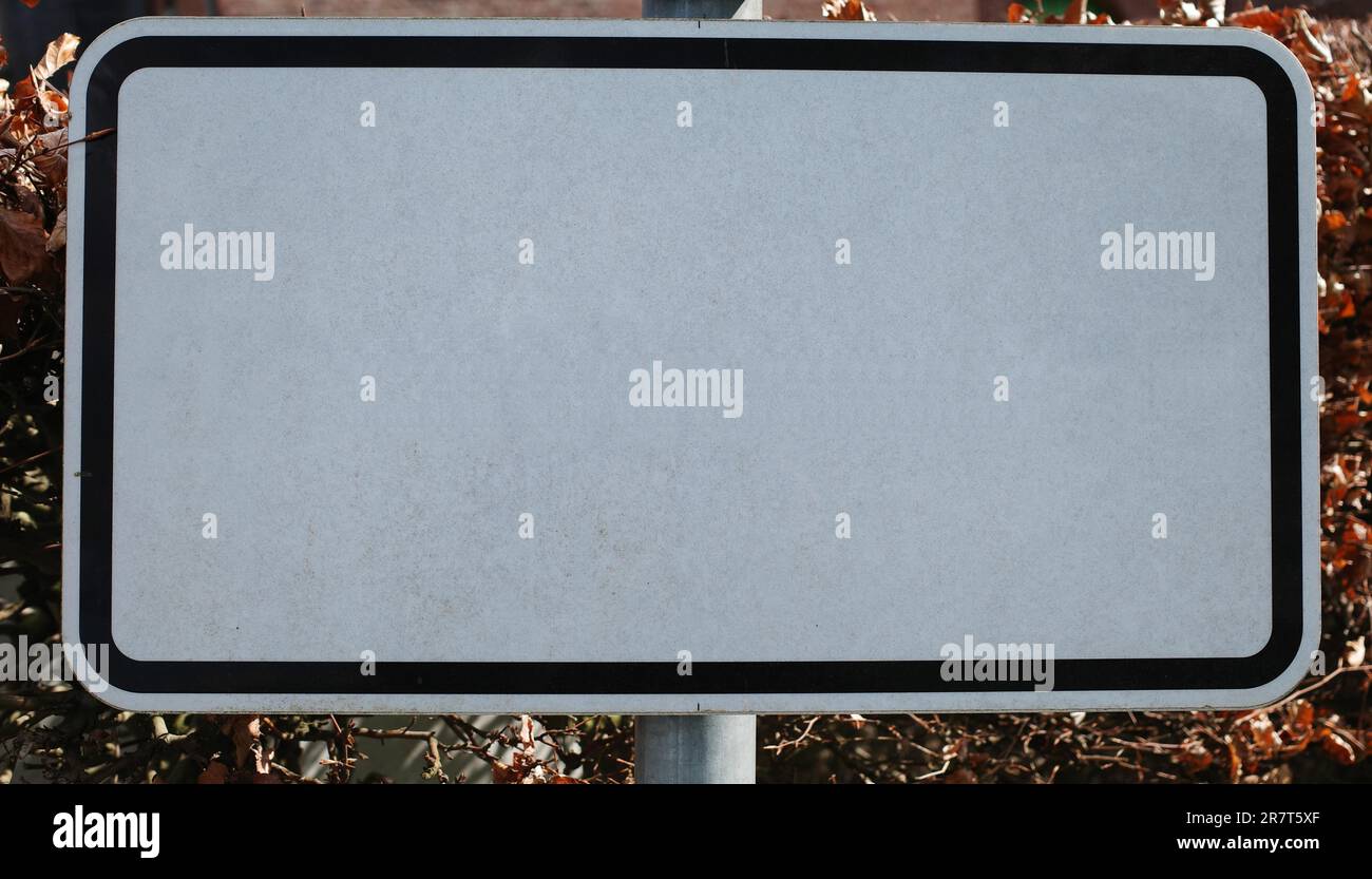 Blank white sign for own design with white background Stock Photo - Alamy