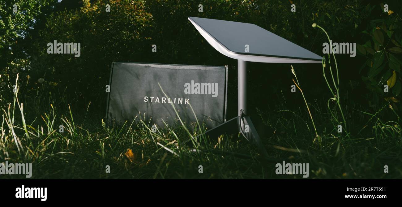 Germany - Jun 16, 2023: Cardboard parcel in backyard at night. Flash ...