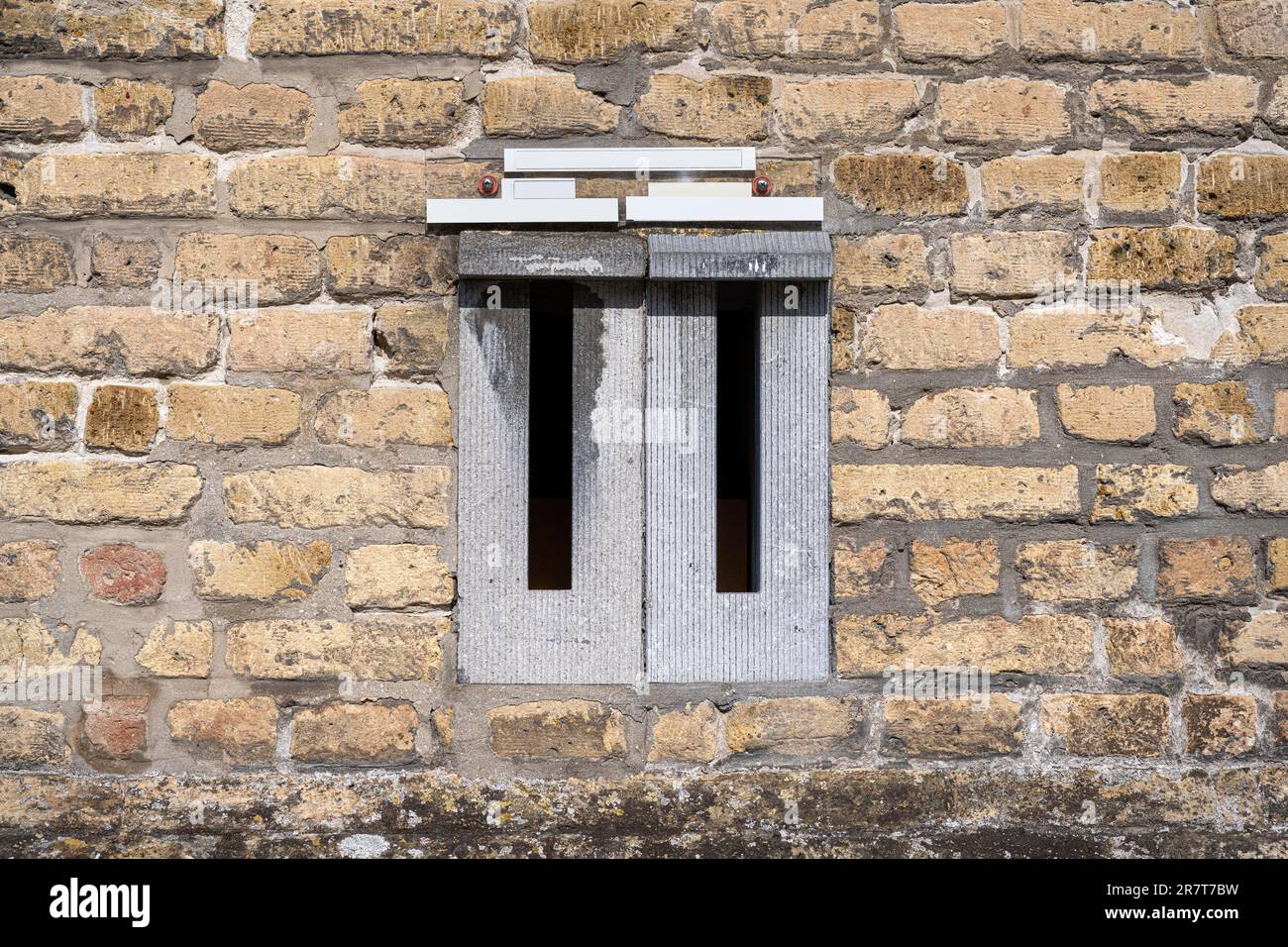 Mailboxes integrated into a brick wall Stock Photo - Alamy