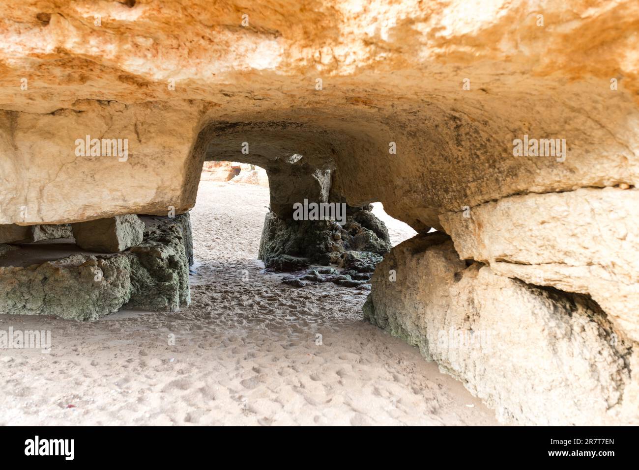 Underpass down under a washed out cliff connecting the different parts ...