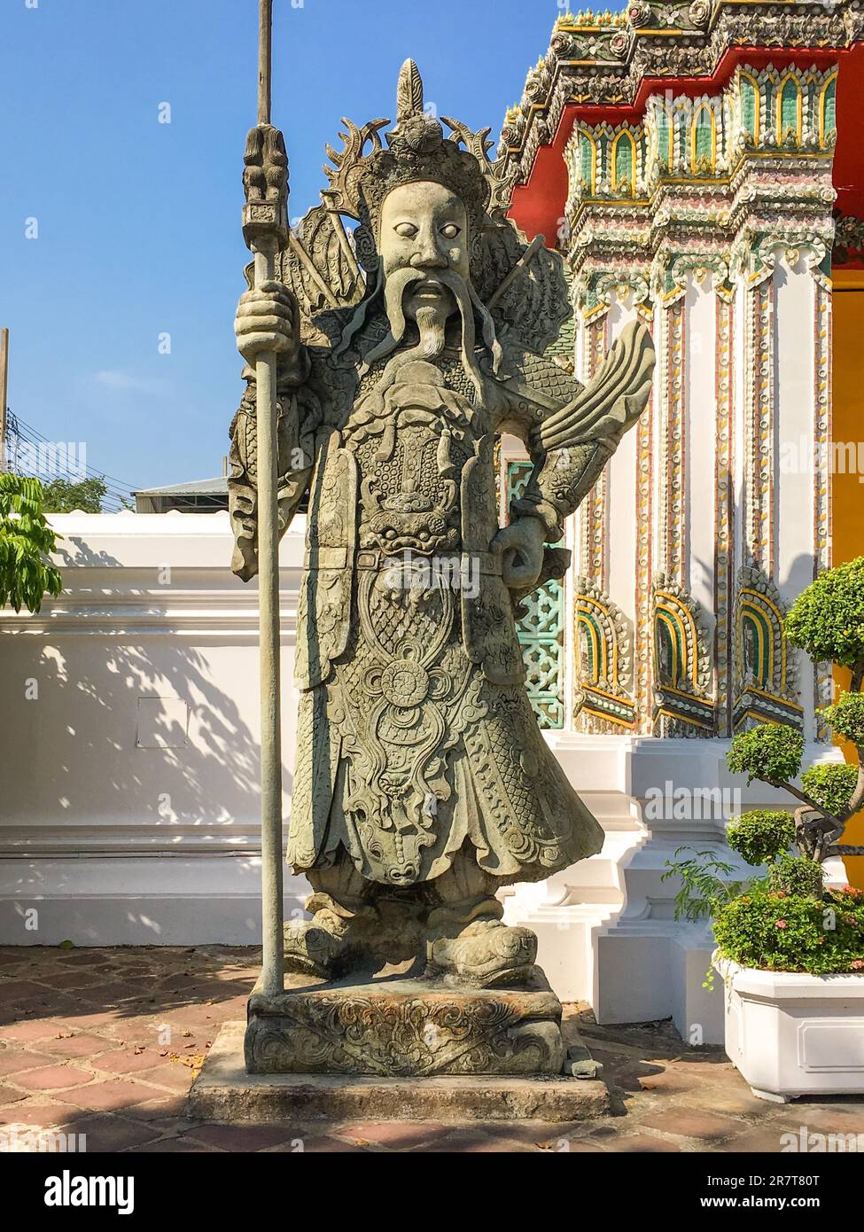 Large Chinese statues in the Wat Pho, guarding the gates of the ...