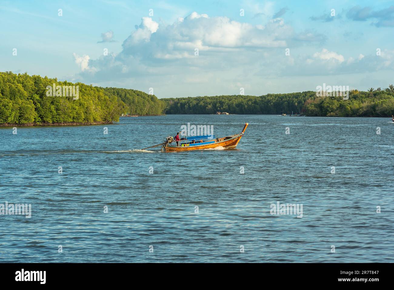 Long-tail boat at the pier on the Krabi river, a 5 kilometres long ...