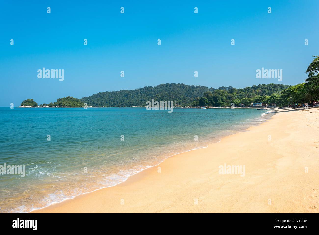 The island of Pangkor with the beach of the tourist village Teluk Nipah ...