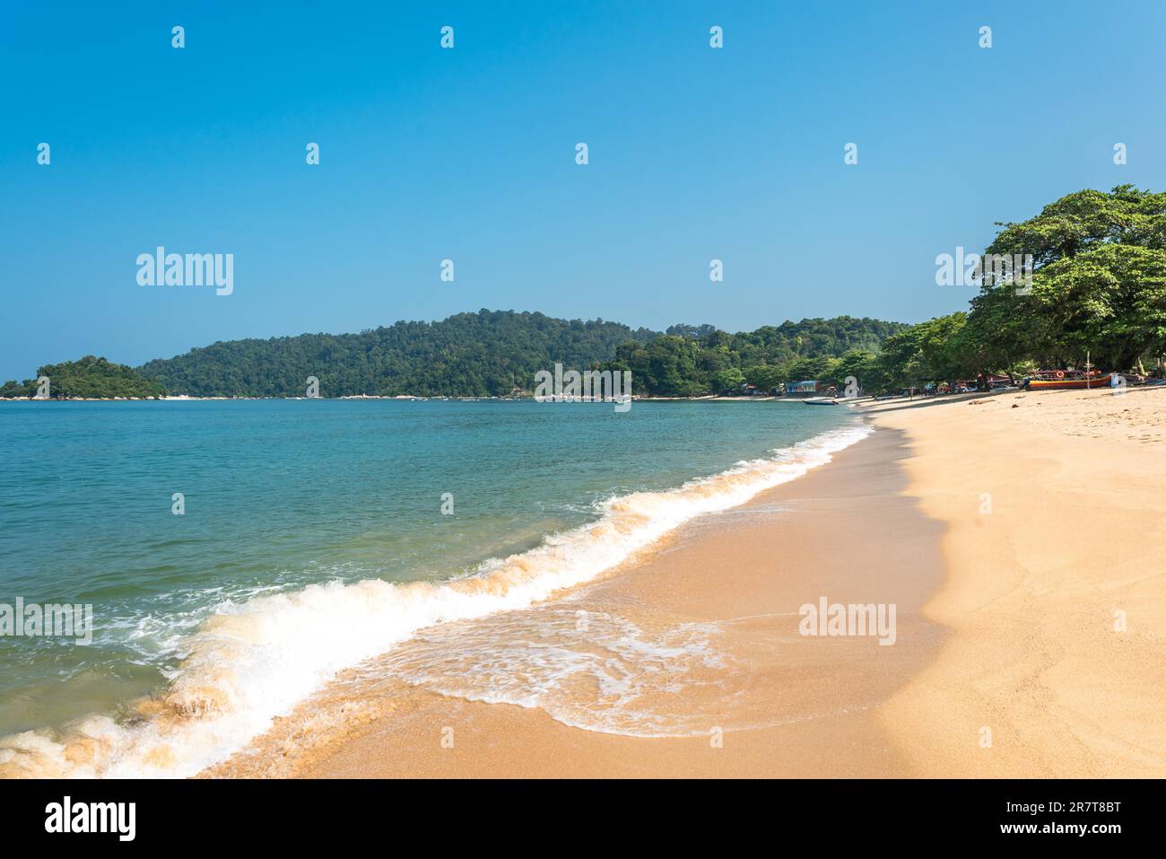 The island of Pangkor with the beach of the tourist village Teluk Nipah ...